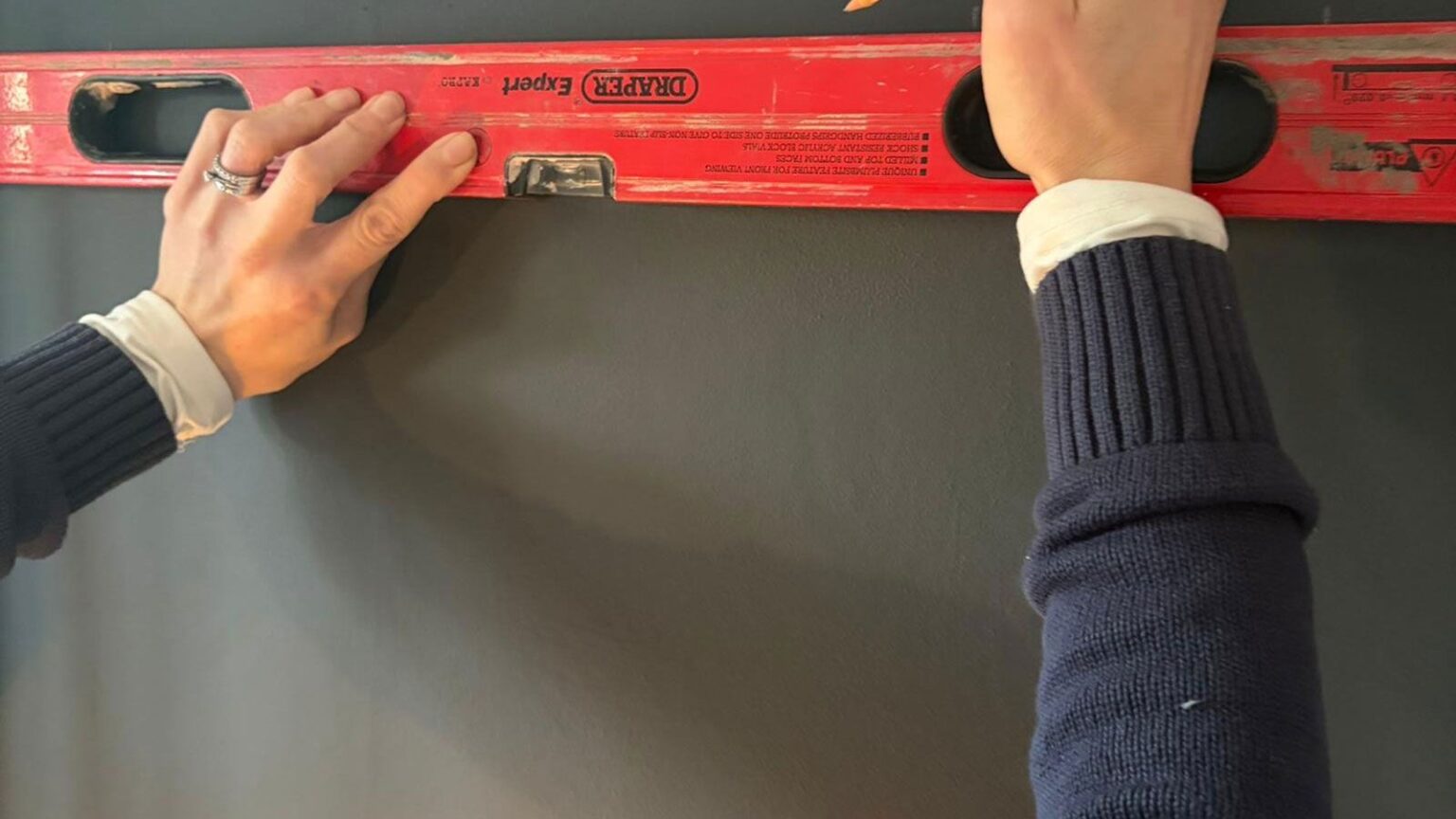 Using a wall panelling kit and moody grey paint to create a feature ...